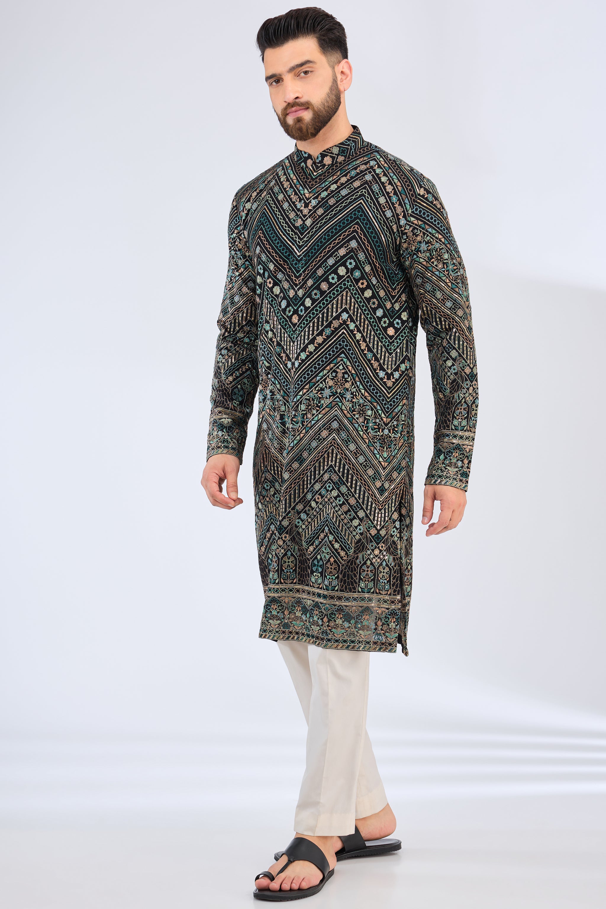 black thread work kurta with intricate flora and fauna embroidery